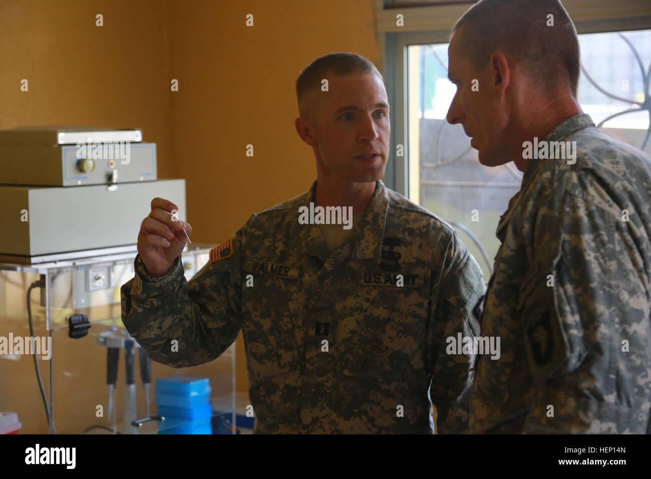 Capt. Sean Palmer, left, biochemist assigned to the 1st Army Mobile ...