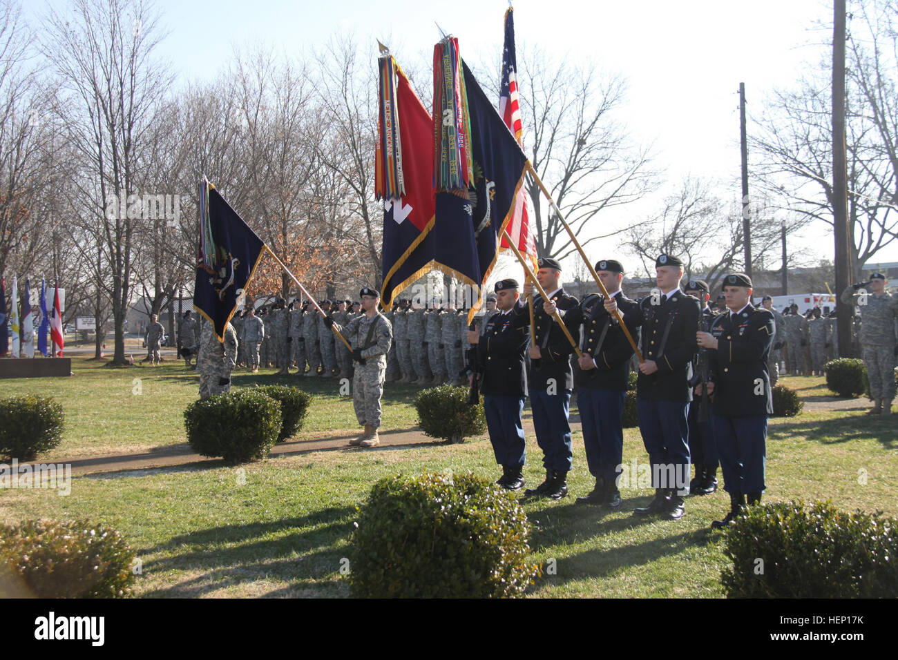 Soldiers from 2nd Brigade Combat Team "STRIKE," 101st Airborne Division (Air Assault) salute as ...