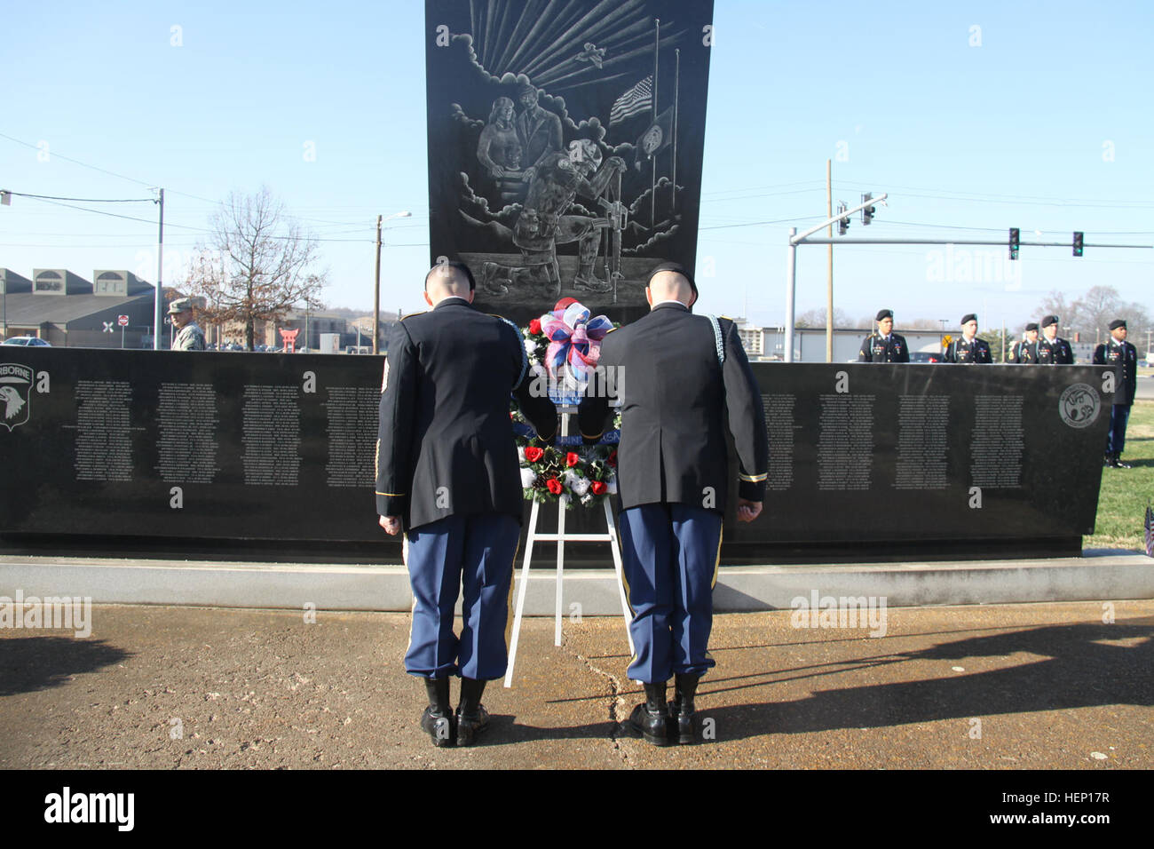 Command Sgt. Maj. John Brady (left) and Col. Peter N. Benchoff (right ...