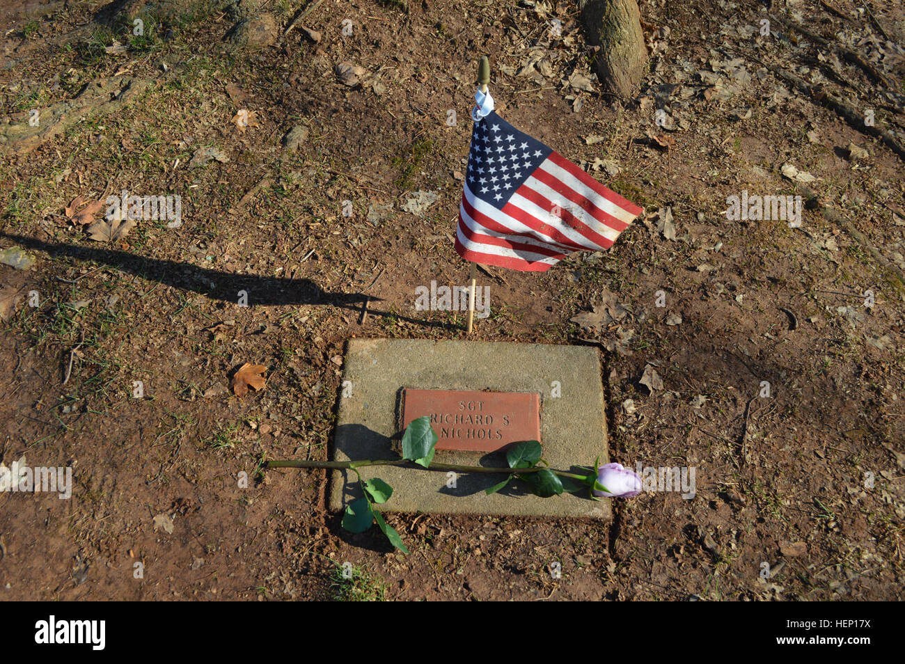 A flower lays in remembrance on a brick with the name of Sgt. Richard S ...