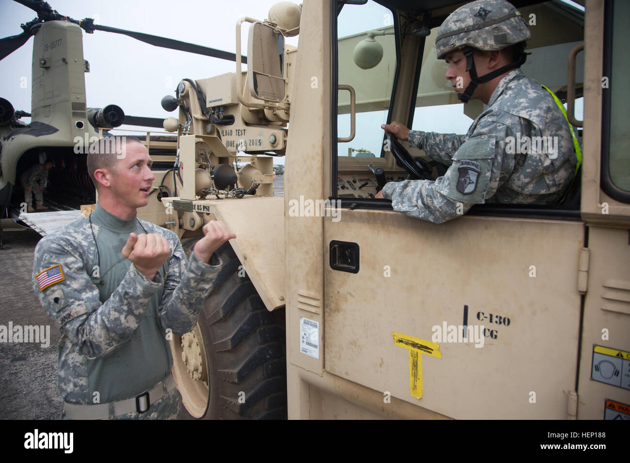 Specialist Tyler Jank, left, aircrew with Task Force Iron Knights ...