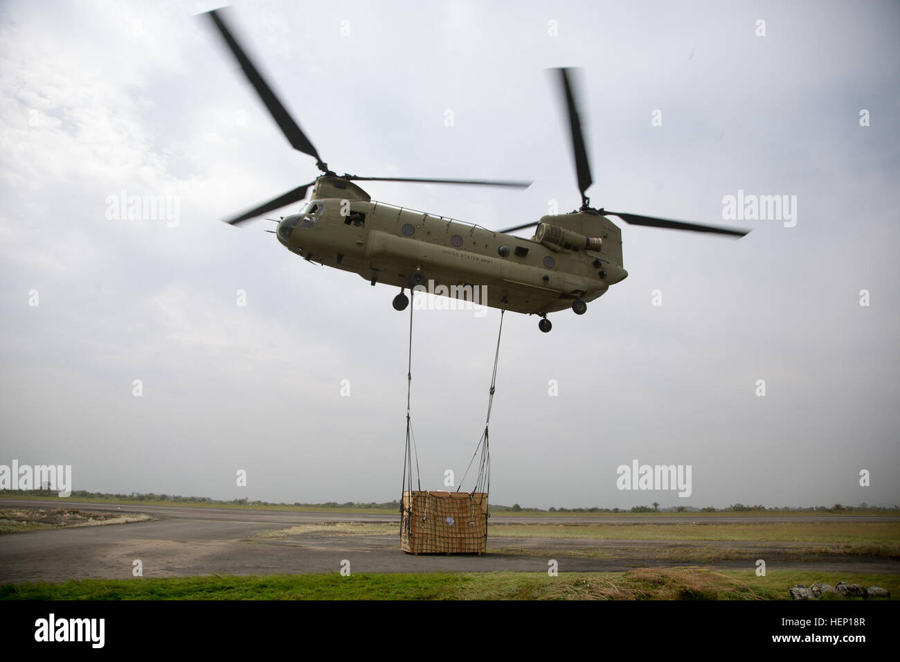 A CH-47 Chinook helicopter with Task Force Iron Knights begins to lift ...