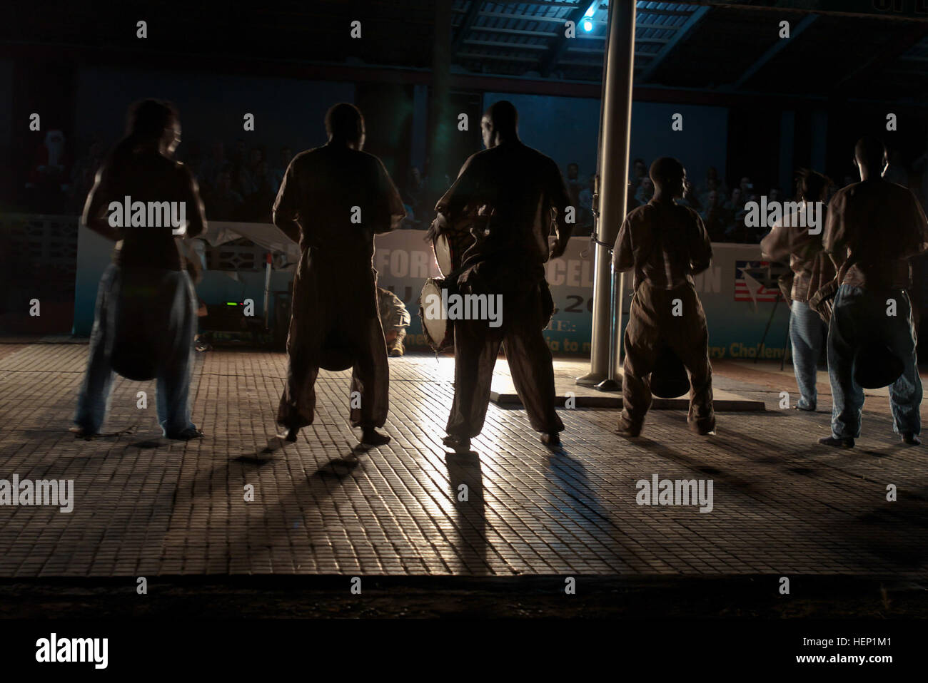 Liberian musicians perform songs at a music and dance program ...