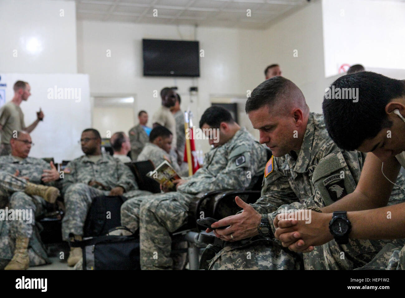 Service members deployed in support of Operation United Assistance wait ...