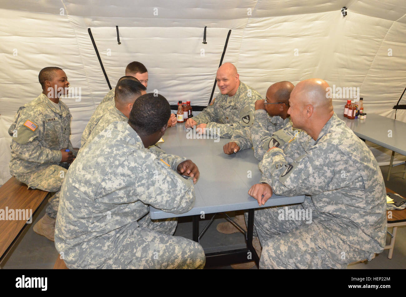 Maj. Alexander Ragan, center, a Littleton, Colo., native and the ...