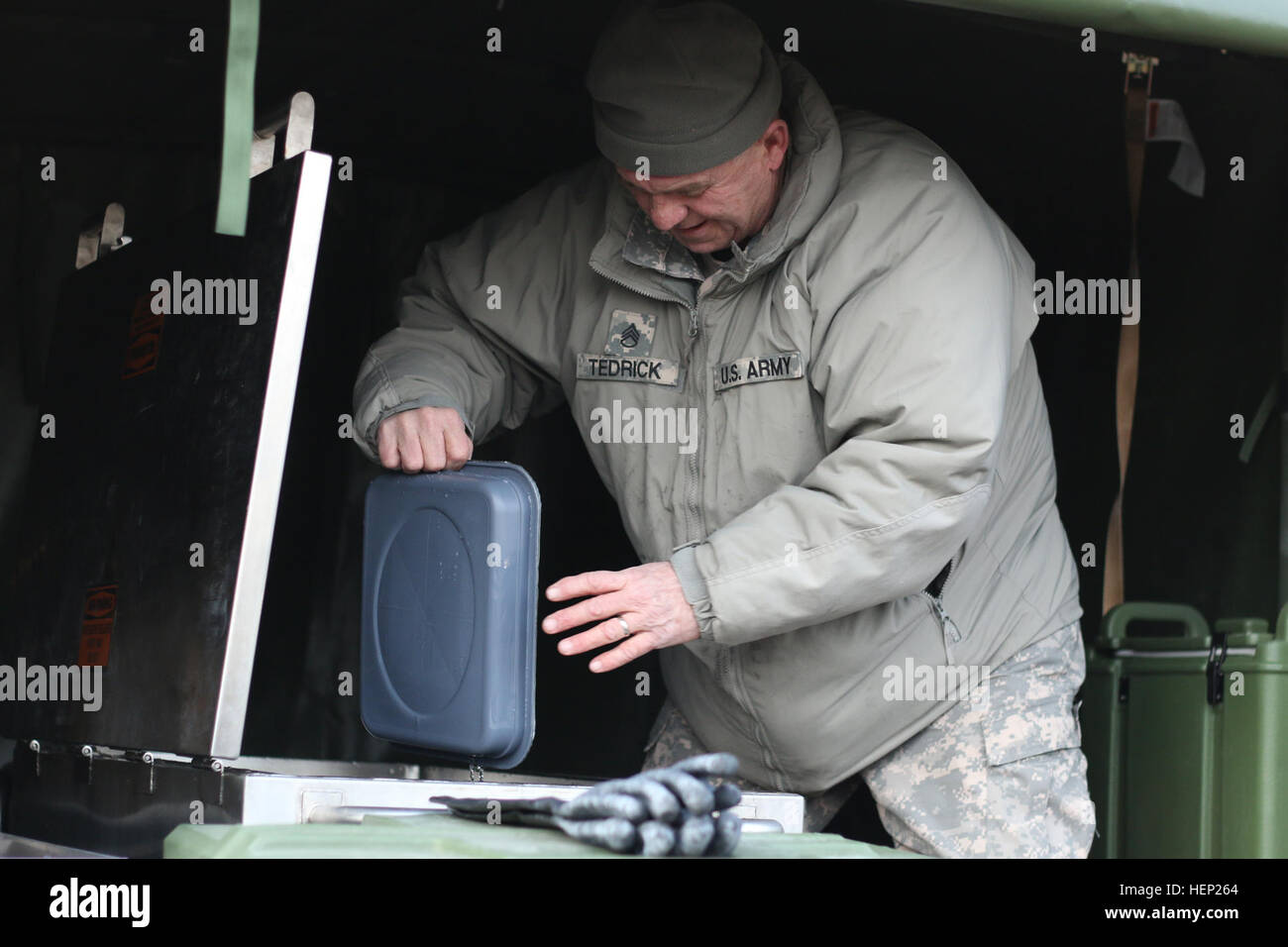 Staff Sgt. Edward B. Tedrick, a food service sergeant assigned to the ...