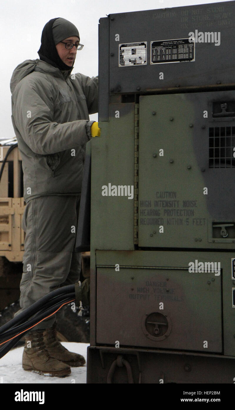 Spc. Michael Hoffman of the 75th Combat Support Hospital runs a system ...