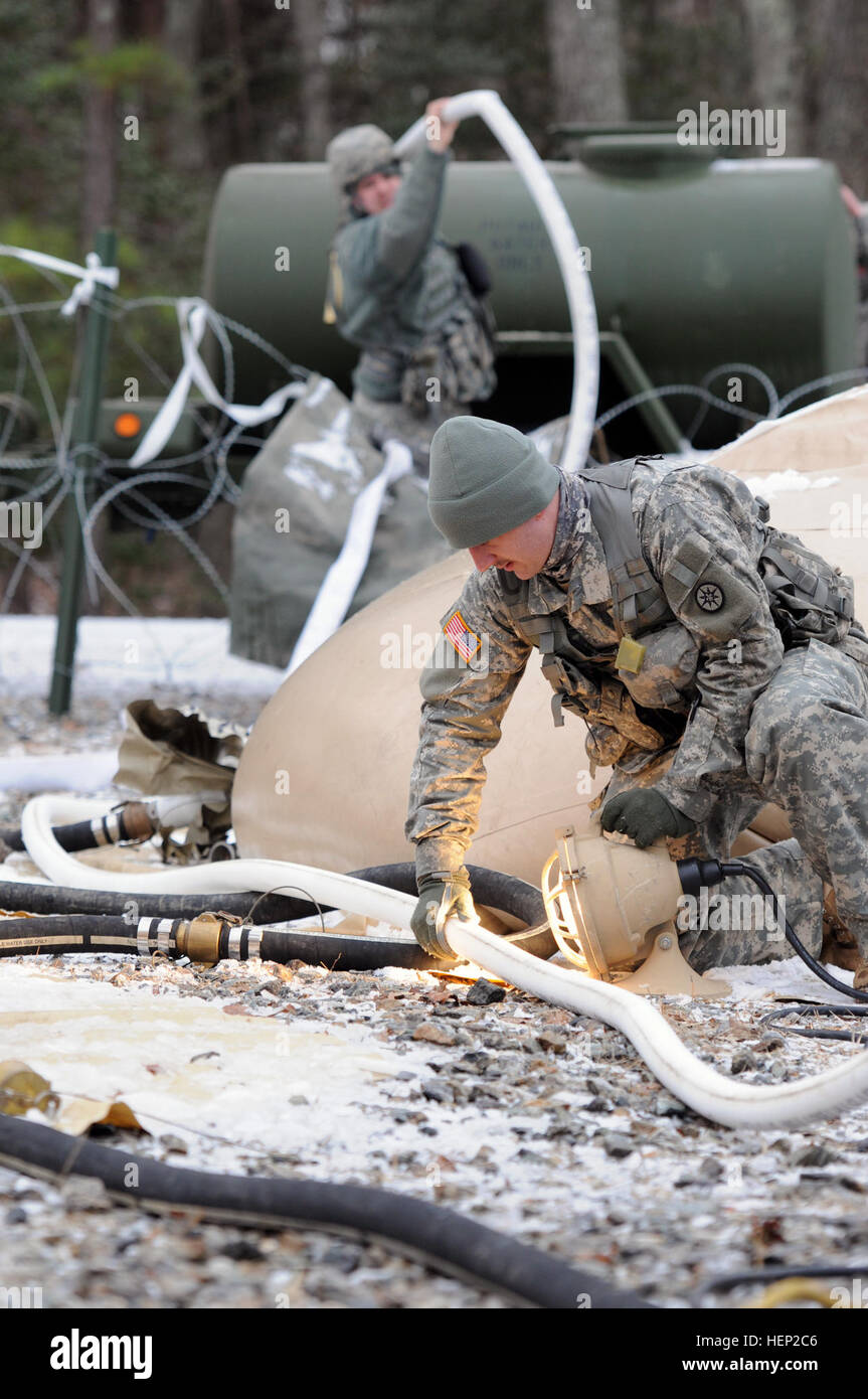 Spc. Justin Fentress, from Pittsburgh, Pa., a water treatment ...