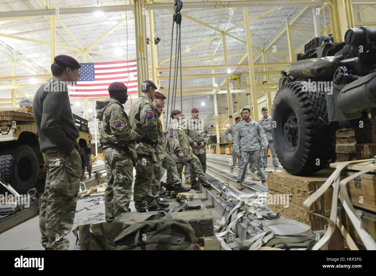 Artillery Soldiers instruct British paratroopers on de-rigging M119A3 ...