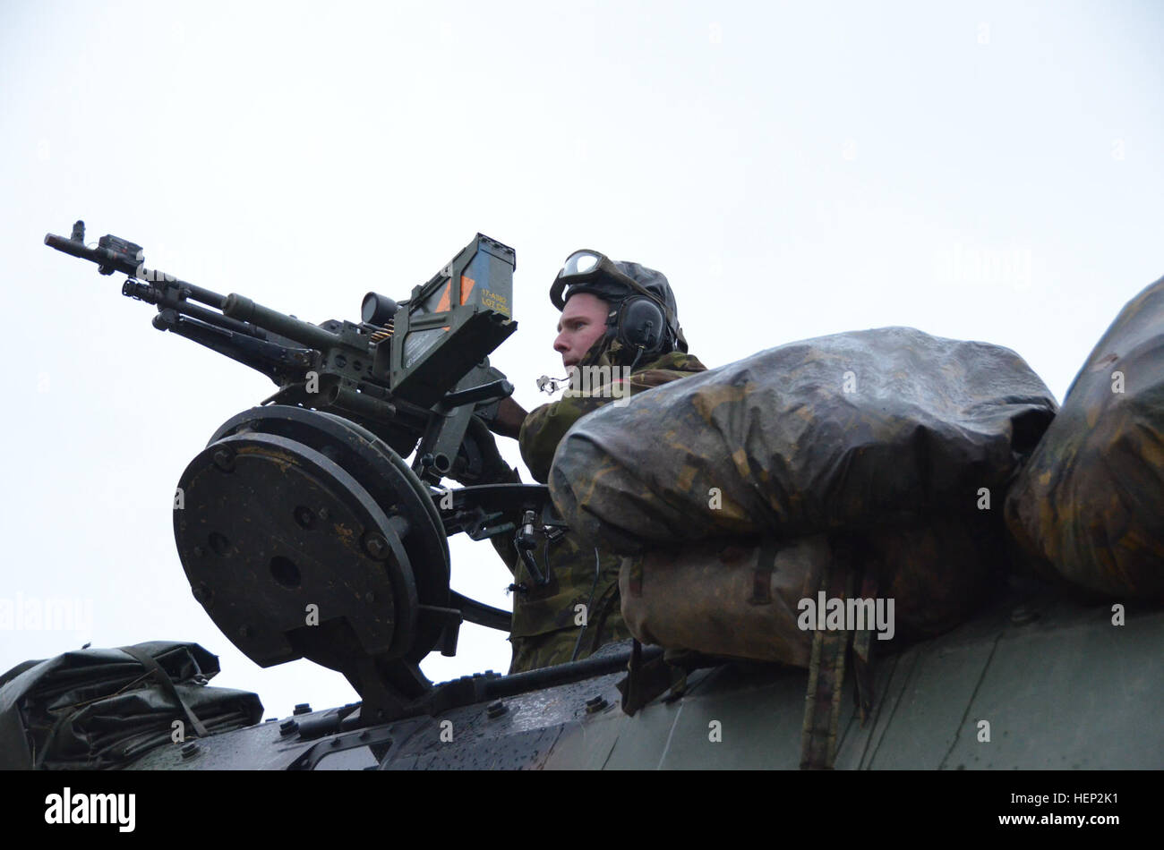 A Dutch soldier of Bravo Battery, Fire Support Battalion scans his ...