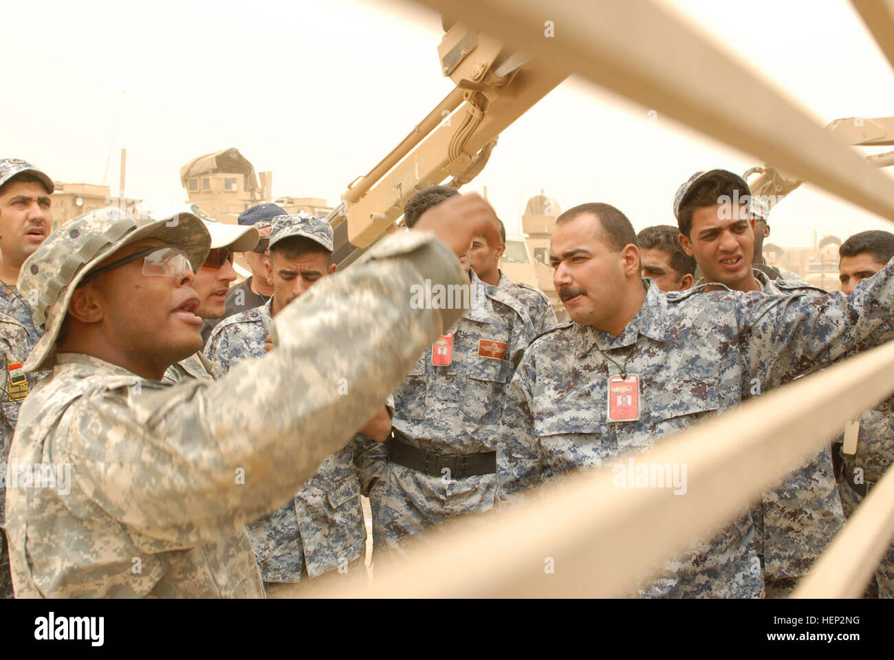 This button does this. FORWARD OPERATING BASE FALCON, Iraq – Sgt. Franklin Myers, a combat ...