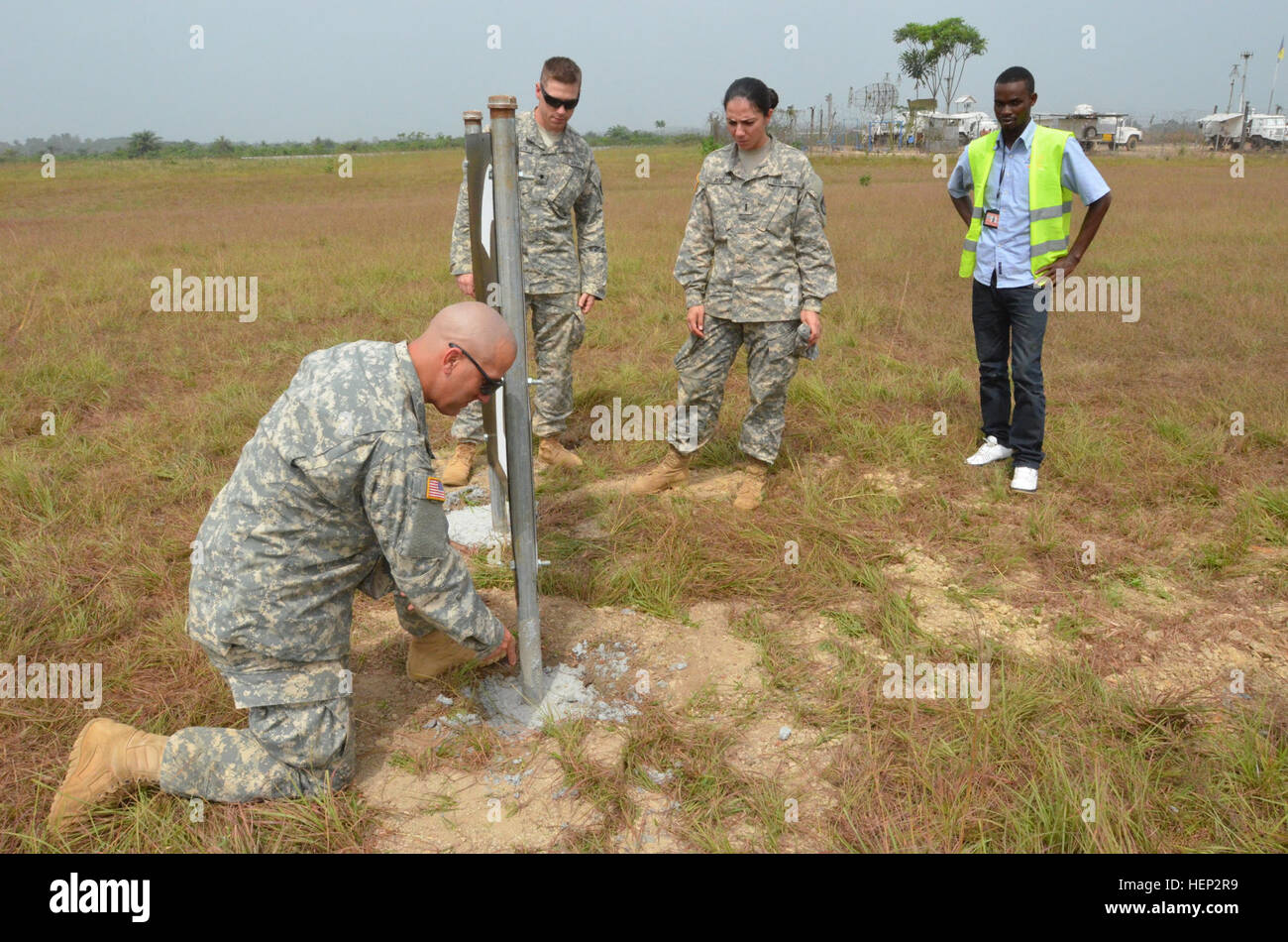 Soldiers of 36th Engineer Brigade, inspect the distance remaining ...