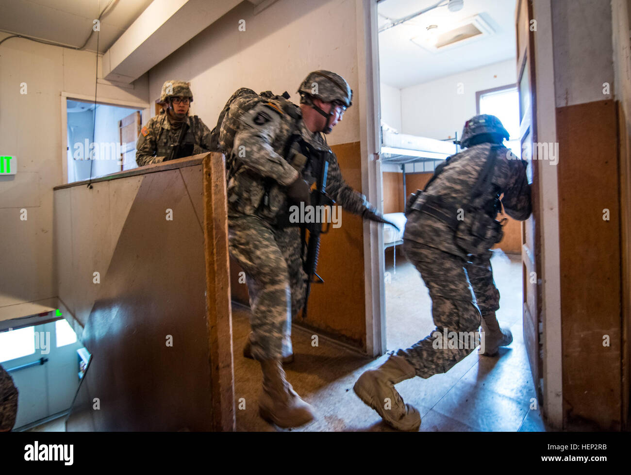 Army Reserve combat engineer medics clear a room during a mass casualty ...