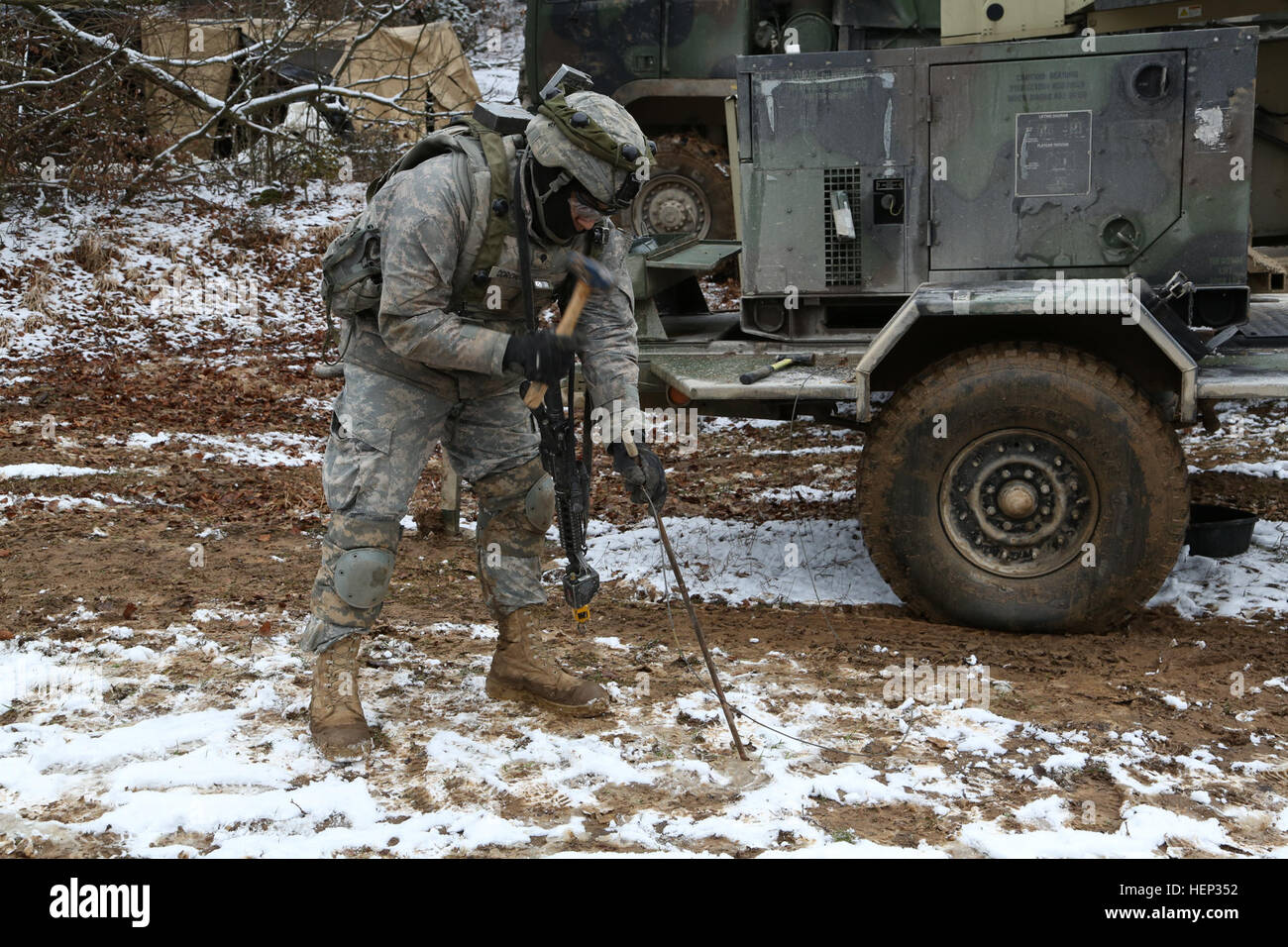 A U.S. Soldier of 4th Squadron, 2nd Cavalry Regiment drives a grounding ...