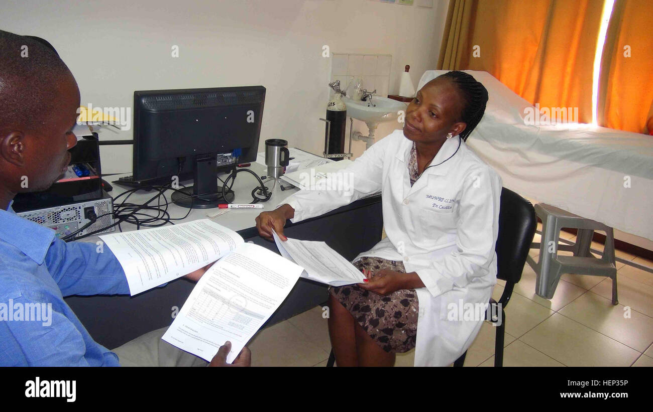 A research physician at Makerere University Walter Reed Project in ...