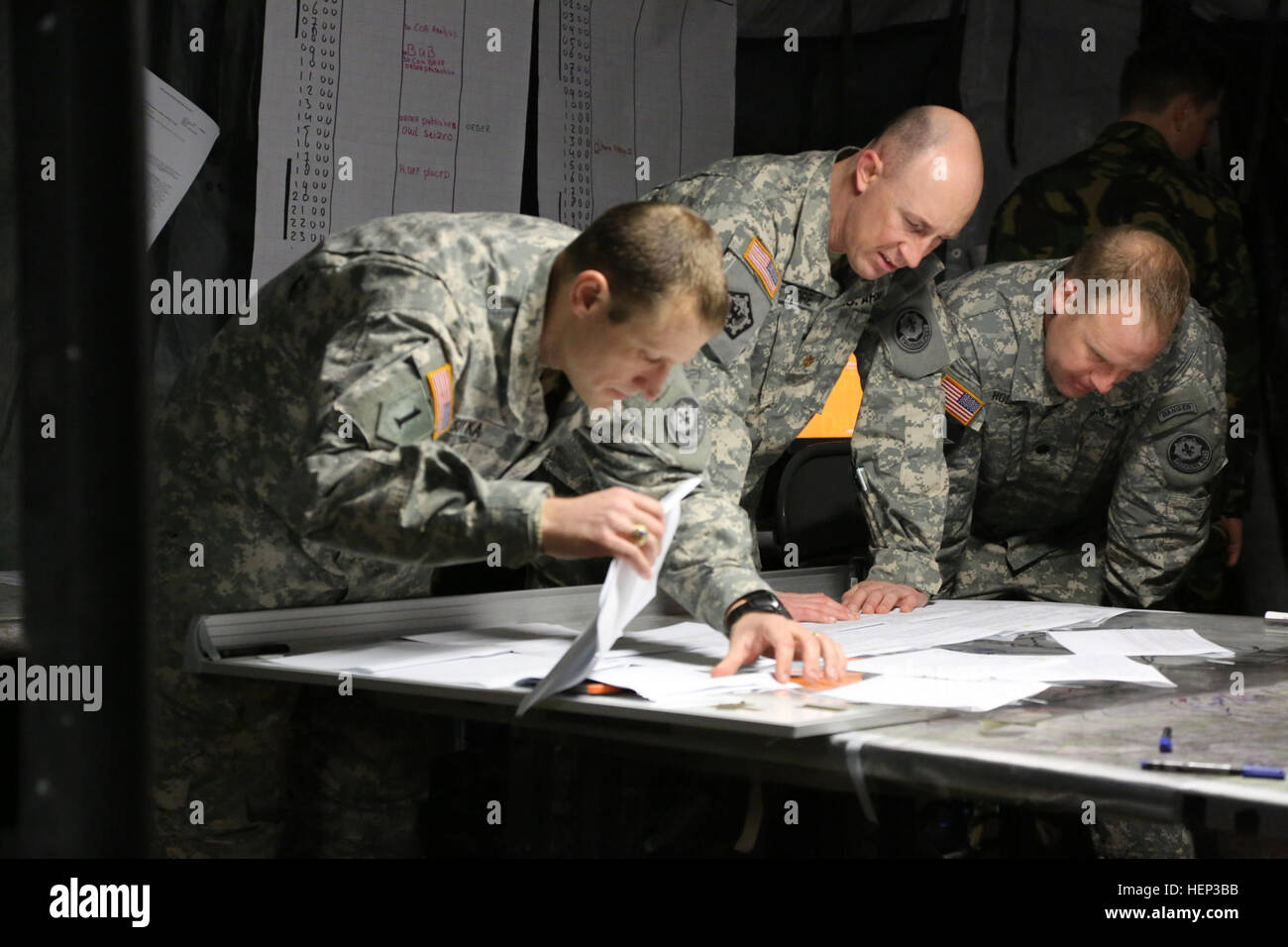 U.S. Army Maj. Michael Soyka, left, the S3 plans officer, Maj. Eric ...