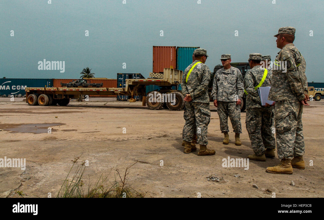 Command Sgt. Maj. Gregory F. Nowak, center, the command sergeant major ...