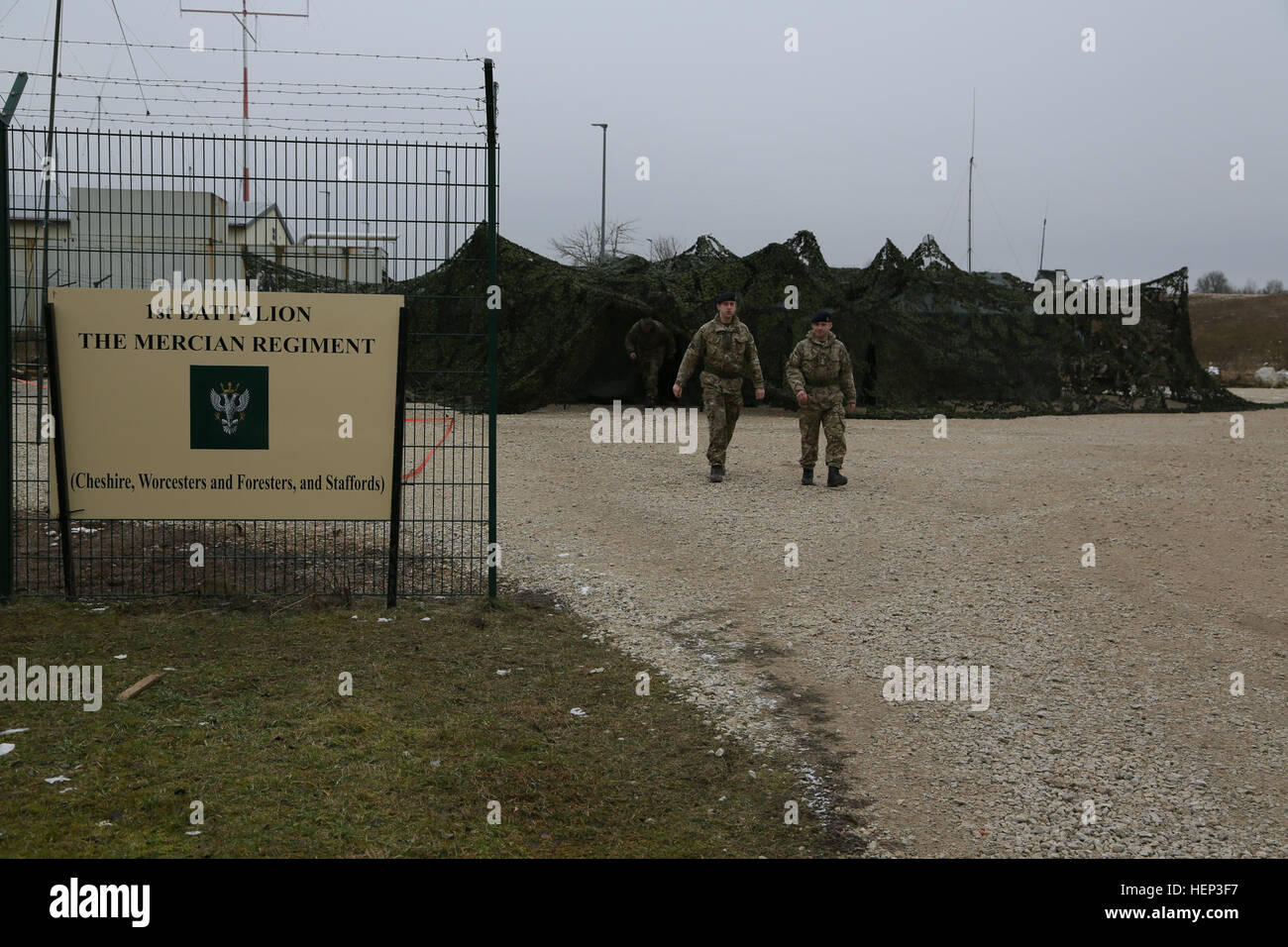 British Army soldiers of 1st Battalion, The Mercian Regiment walk out ...