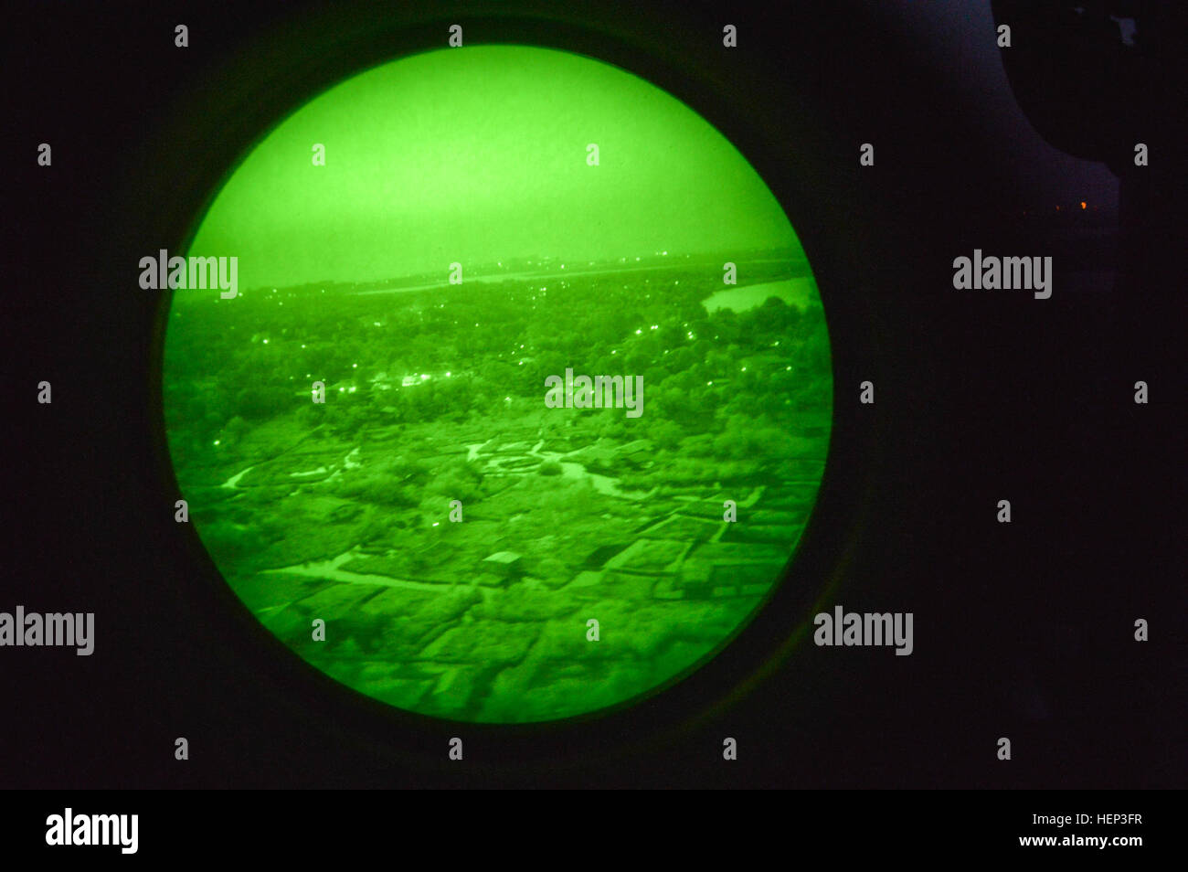 The view through night vision goggles of a UH-60 Black Hawk helicopter ...