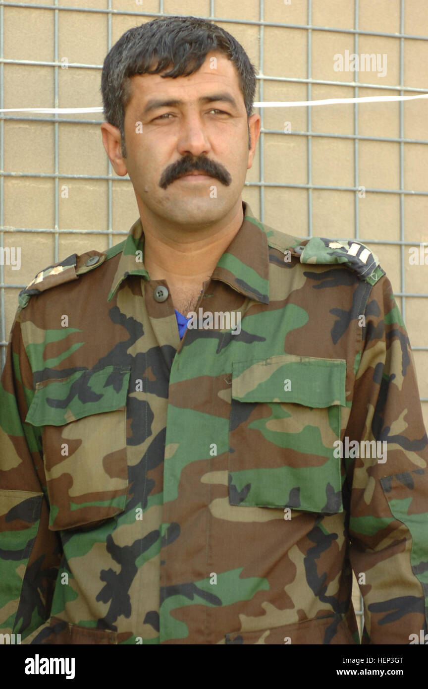 Commander of 3rd Brigade, 201st Corps Mohammad Ashraf poses to get his ...