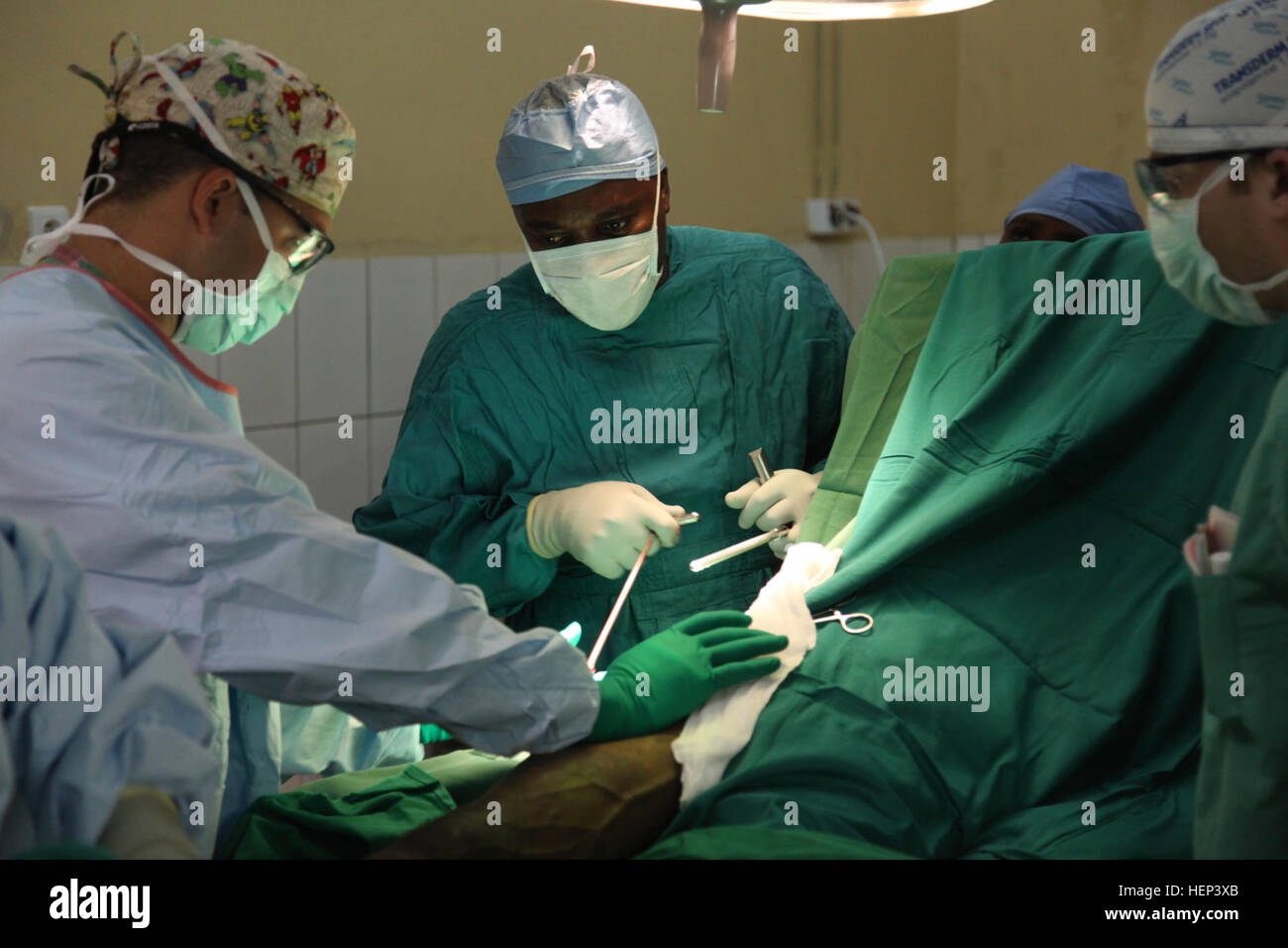 Clockwise from left to right, U.S. Army Maj. James Blair, orthopedic ...