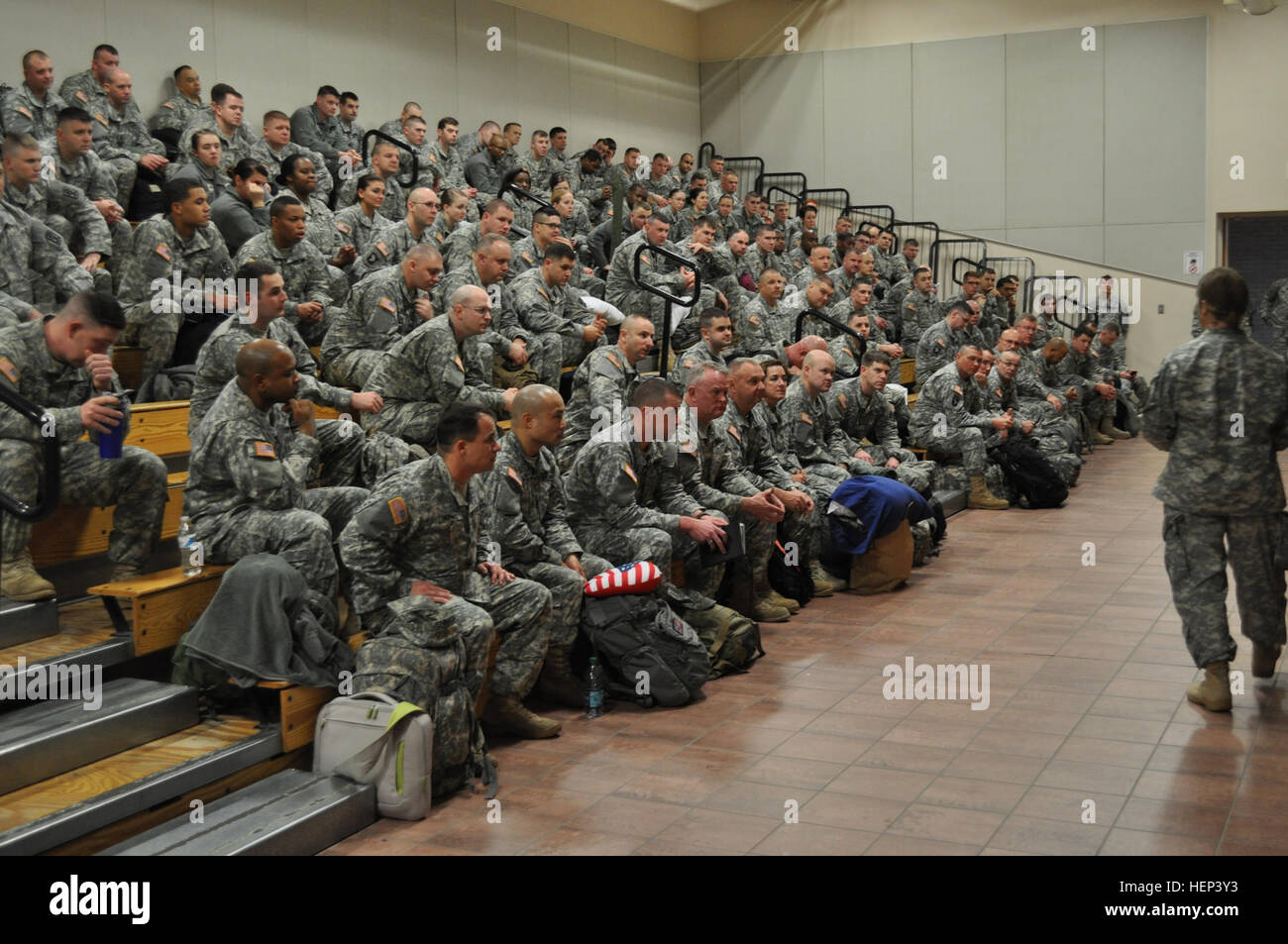 Soldiers from the 2-263rd ADA receive a welcome home brief at the Silas ...