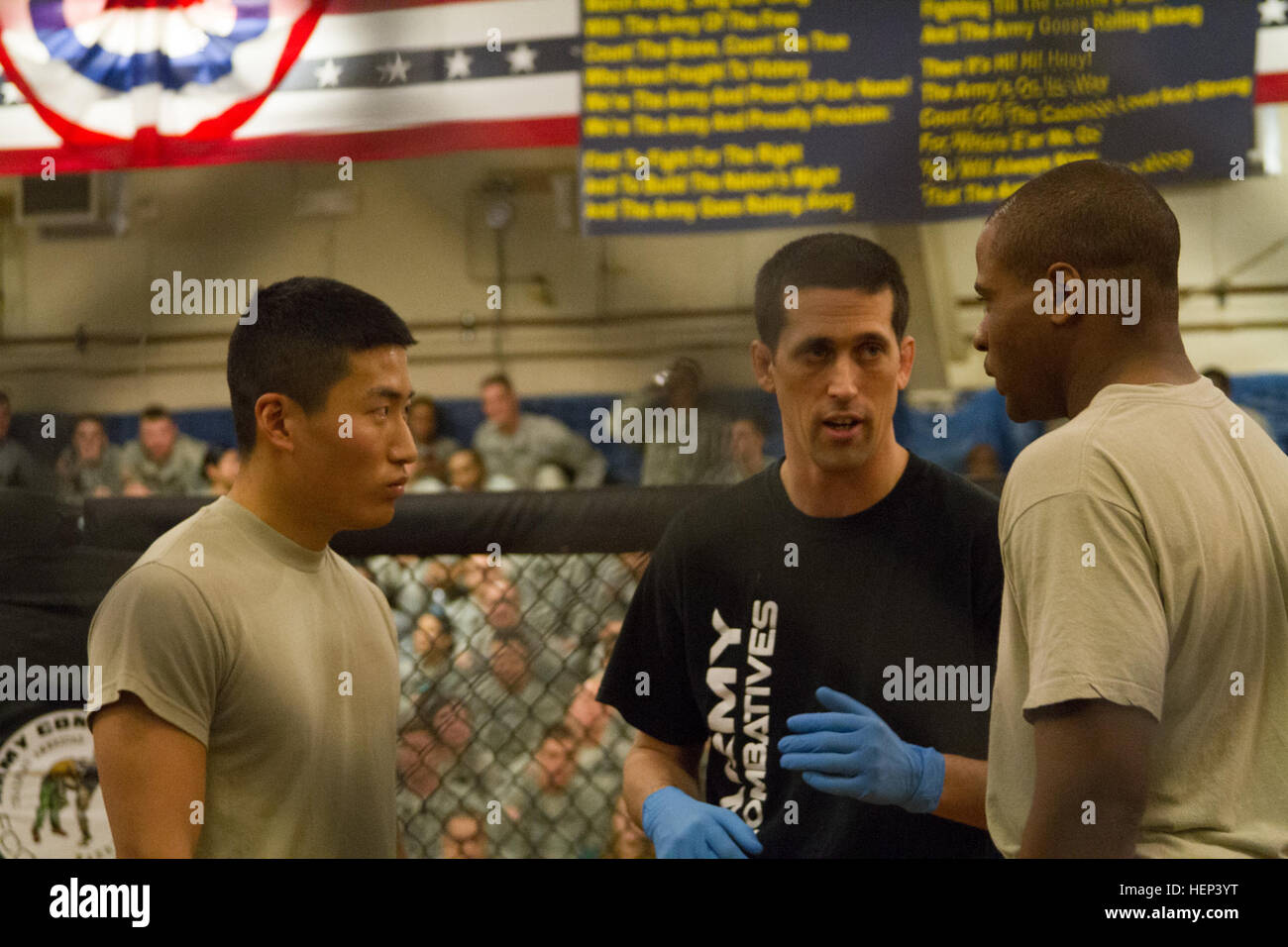 A combatives official from Headquarters and Headquarters Battalion, 4th ...