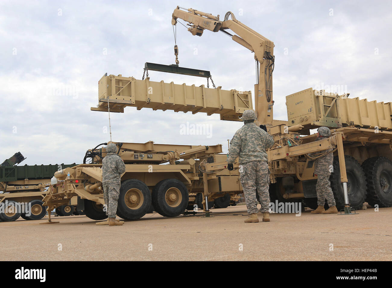Soldiers of 69th Air Defense Artillery Brigade practice reload drills ...