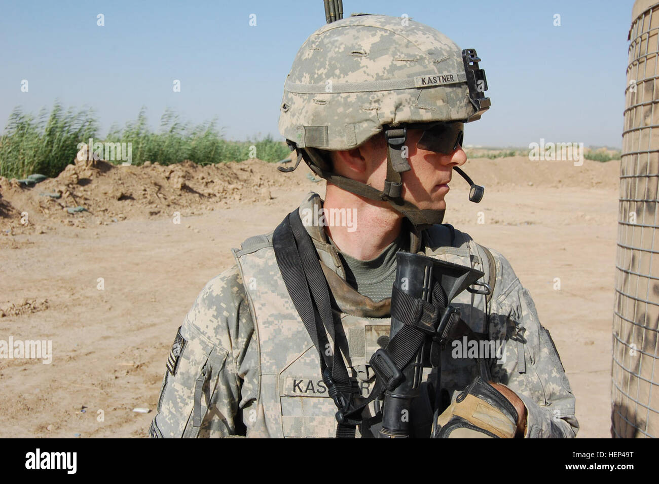 Spc. Gregory Kastner, an Excelsior, Minn., native, listens to his radio ...