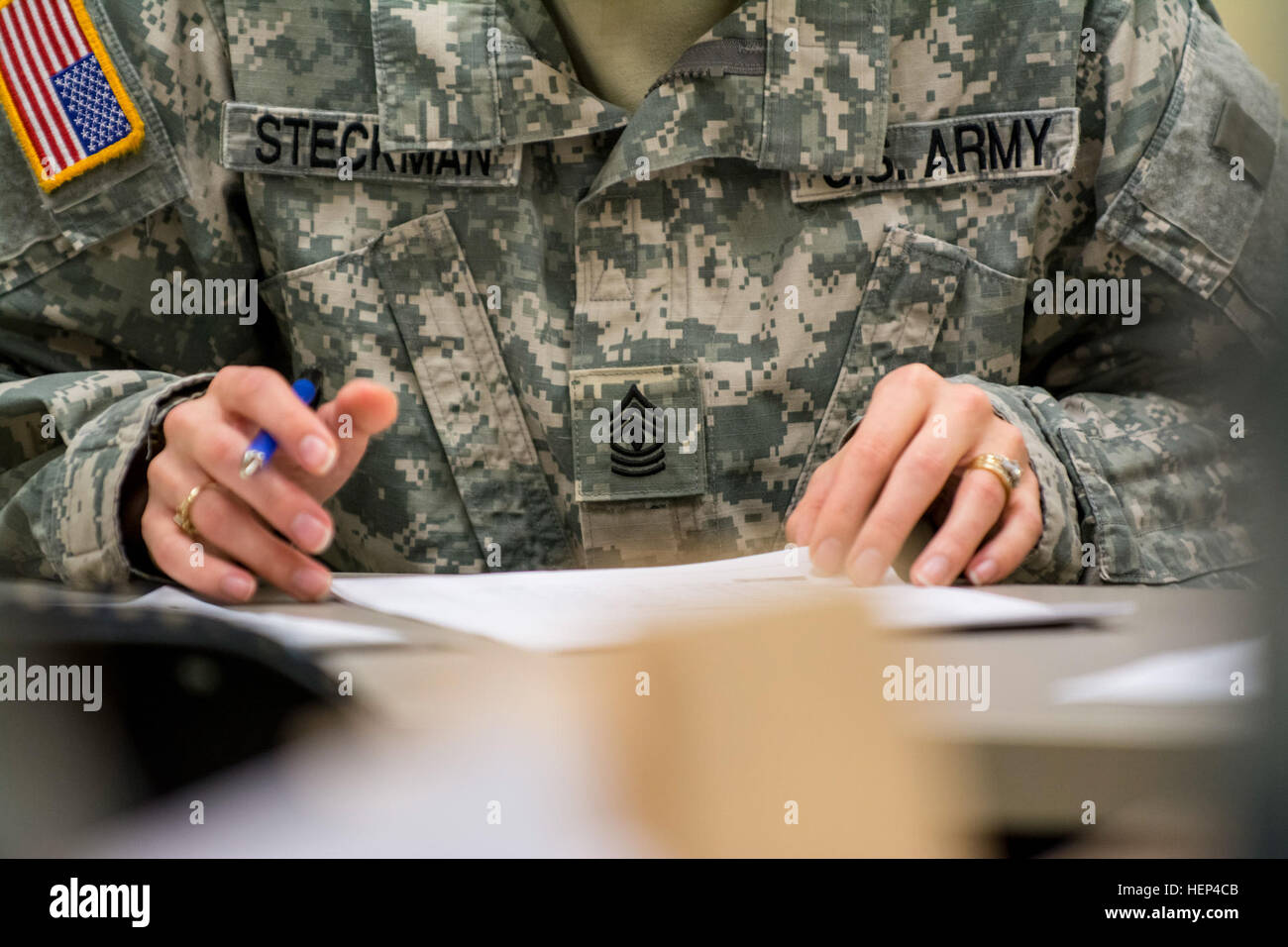 First Sgt. Raquel Steckman works on an operations order for an upcoming ...
