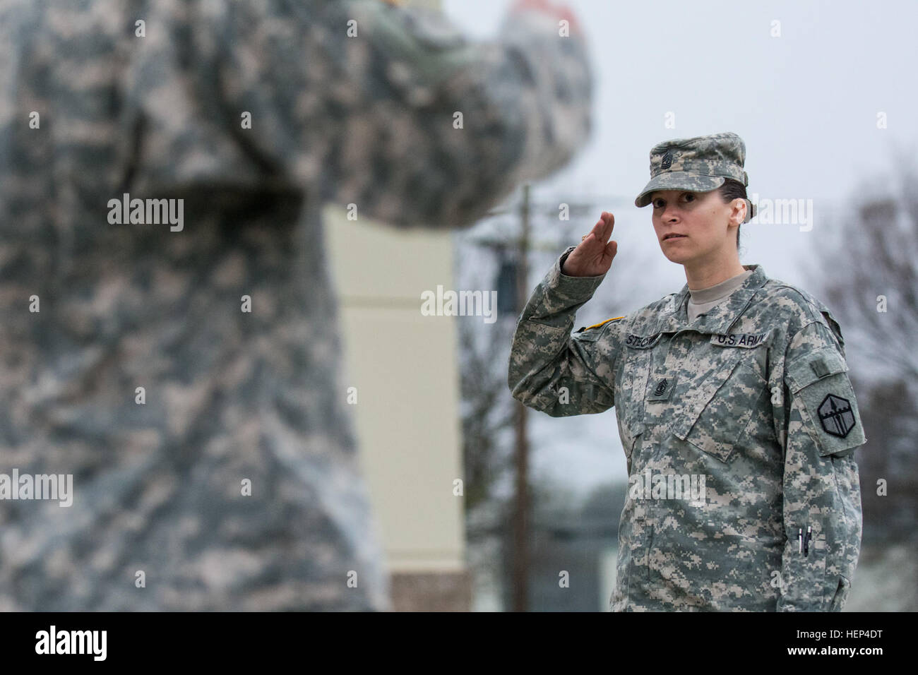First Sgt. Raquel Steckman salutes her platoon sergeants with the 374th ...