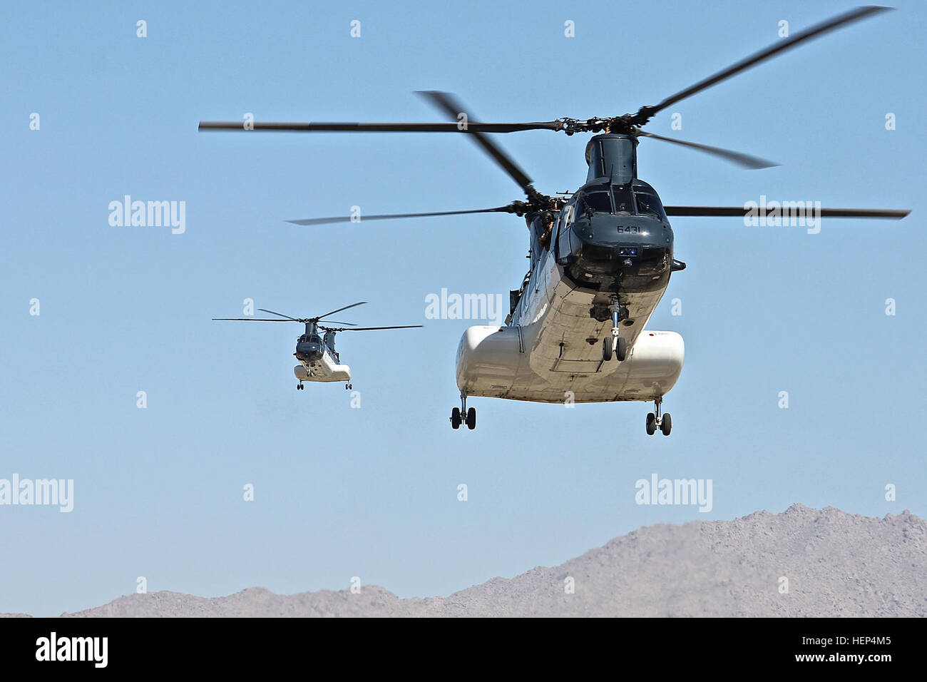 Two U.S. Department of State CH-46 Sea Knight helicopters carrying ...