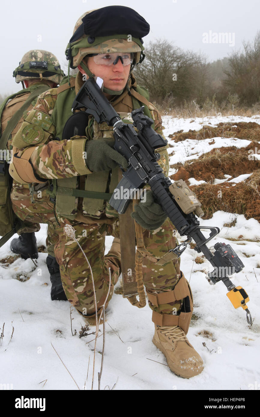 A Georgian soldier of Alpha Company, 43rd Mechanized Infantry Battalion ...