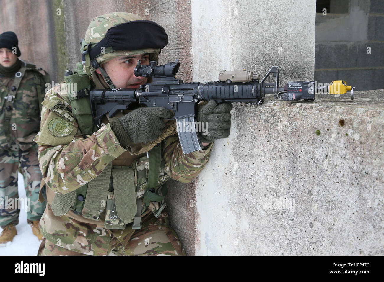 A Georgian soldier of Charlie Company, 43rd Mechanized Infantry ...