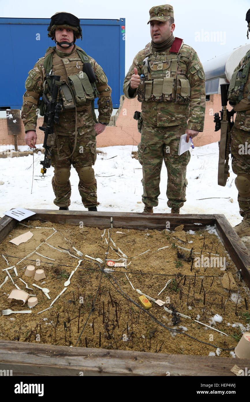 Georgian soldiers of Alpha Company, 43rd Mechanized Infantry Battalion ...