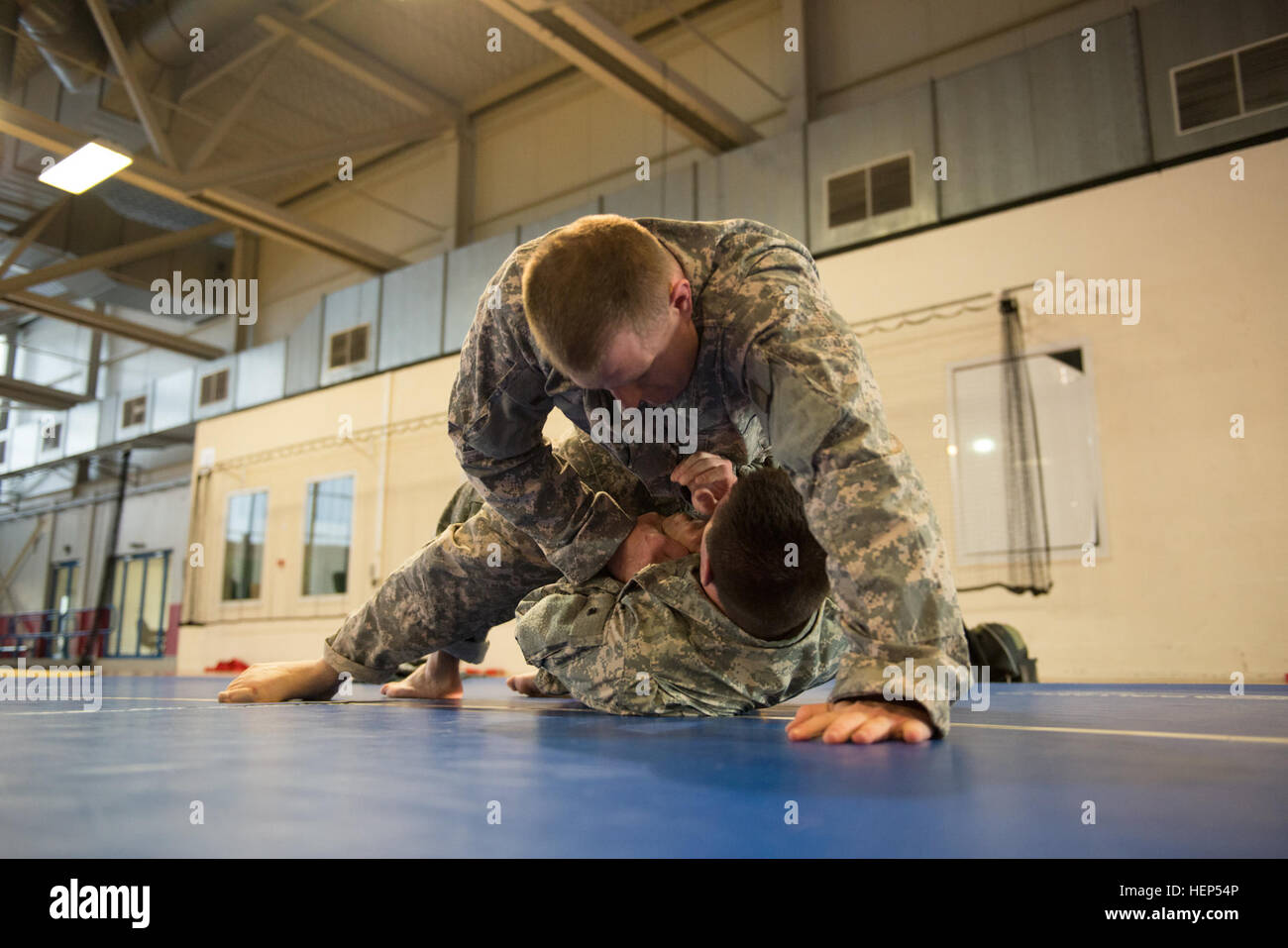 U.S. Army Sgt. 1st Class Bryan Norris, on top, with Headquarters, Rapid ...