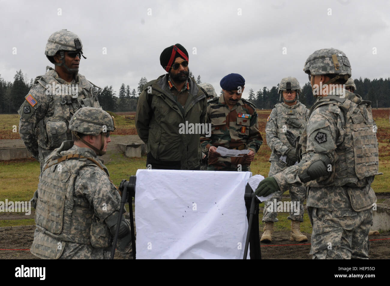Soldiers from the 555th Engineer Brigade, I Corps, provide a route ...