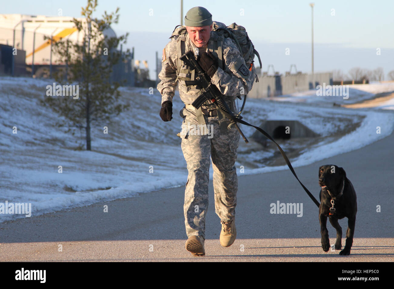 Sgt. Nathaniel Beeghly, a combat engineer turned handler, runs the last ...