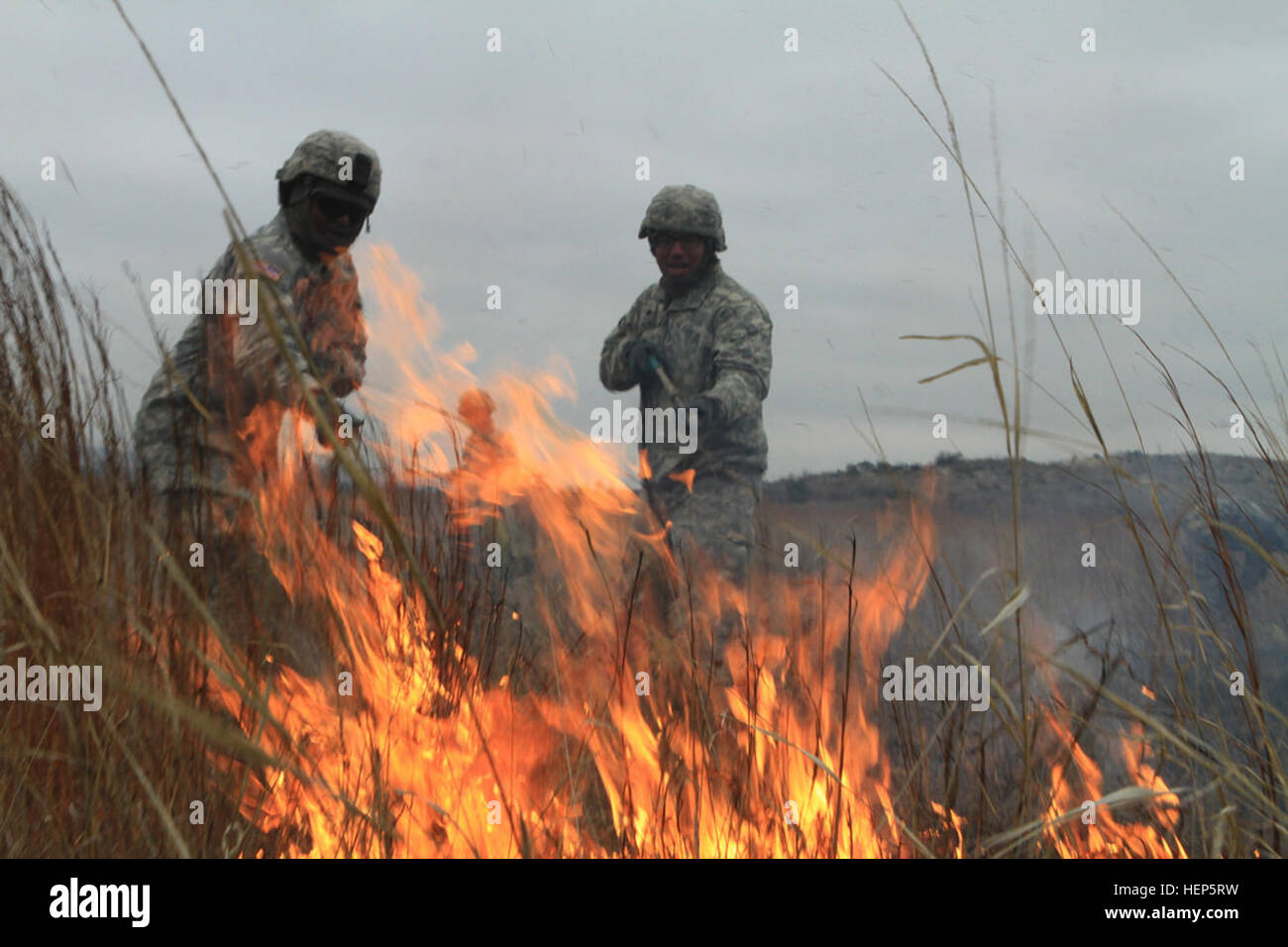 Under the watchful eye of the range safety officer and using the proper ...