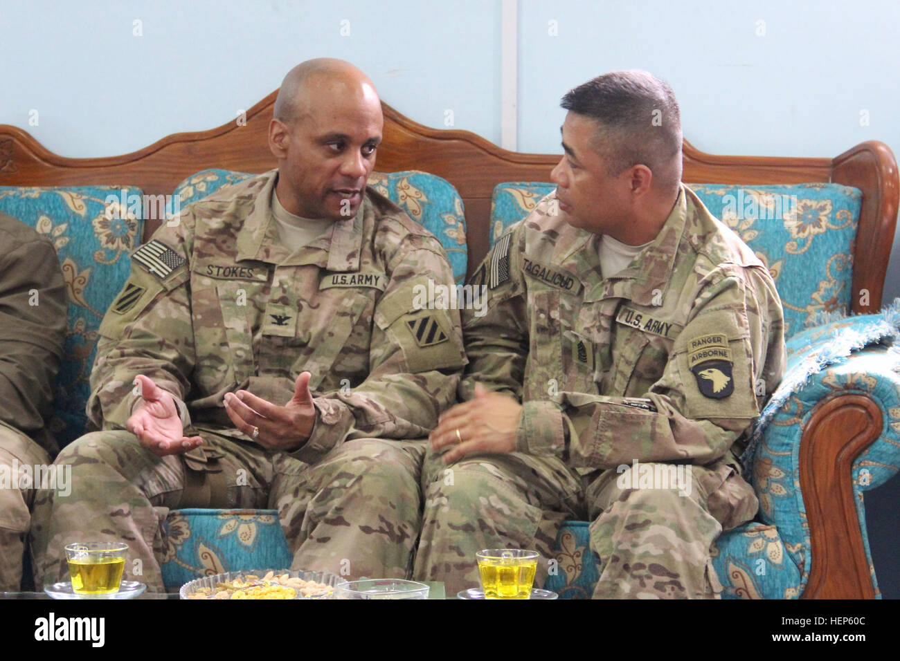 Col. Gregory Stokes (left), the Police Advisory Team commander assigned ...