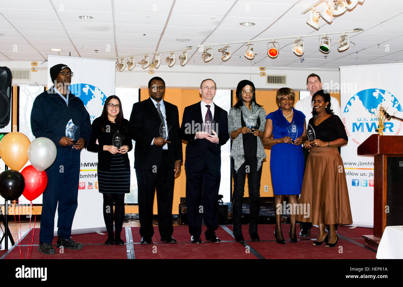Family and Morale, Welfare and Recreation employees pose for a ...