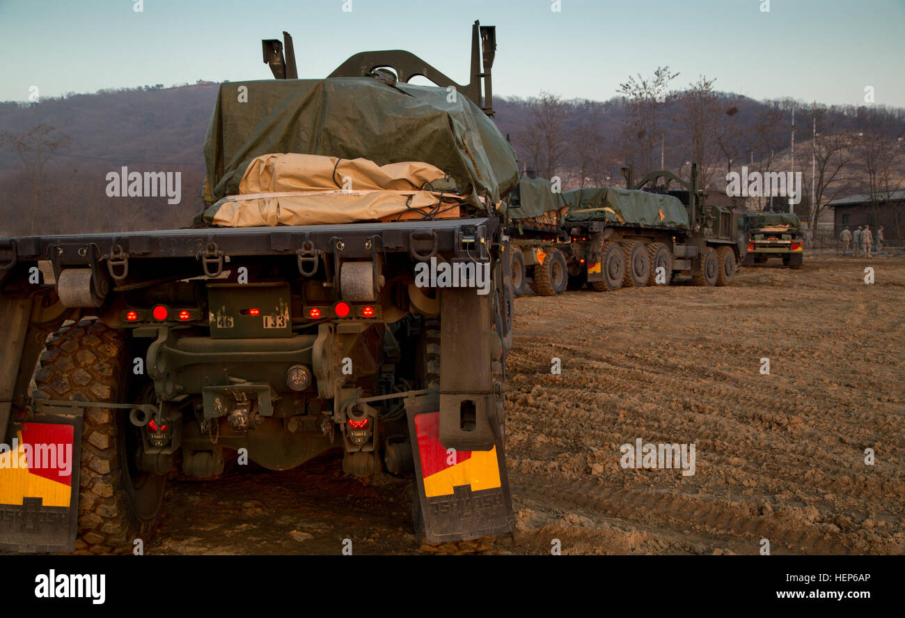 A U.S. Army convoy, carrying supplies and equipment from the 25th ...