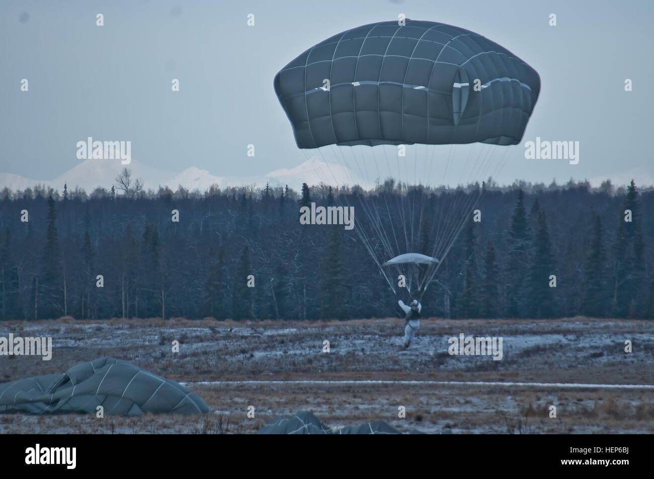 A paratrooper with U.S. Army Alaska’s 4th Infantry Brigade Combat Team ...