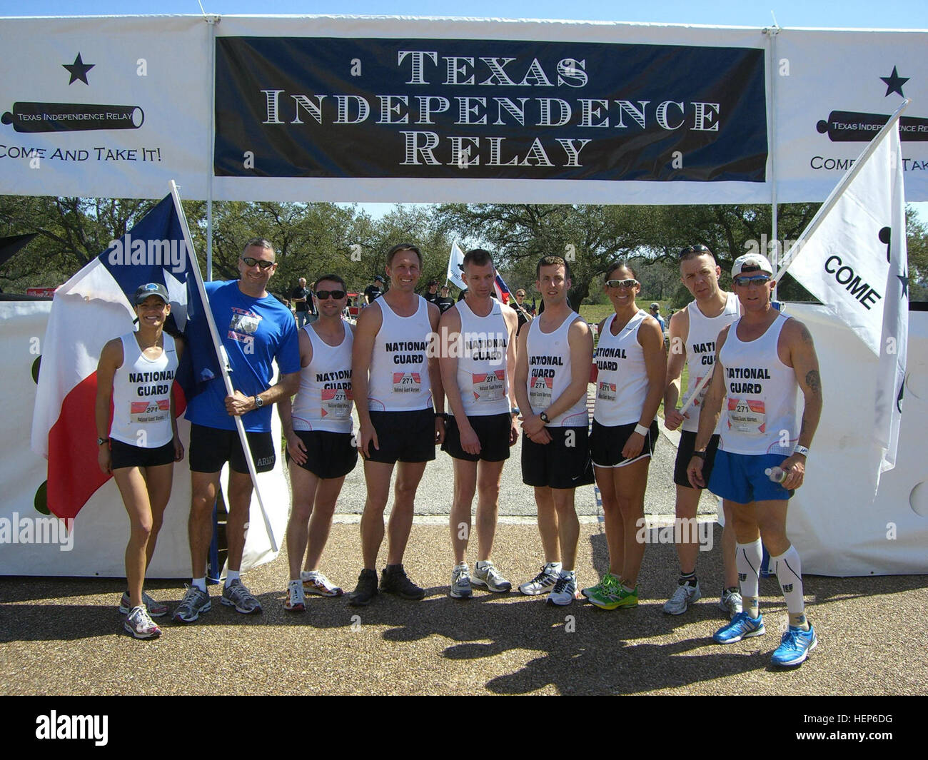 Nine members of the National Guard All-Guard Marathon Team pose after ...