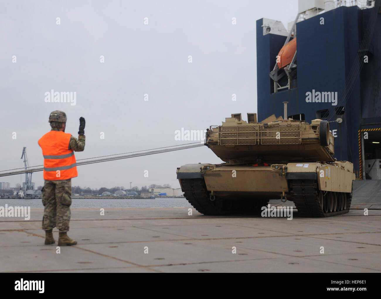 Soldiers from the 3rd Infantry Division offload an M1A2 Abrams Main ...