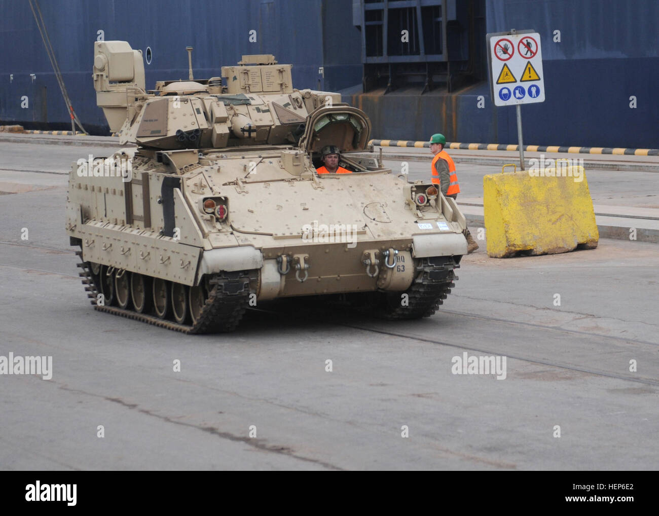 Soldiers from the 3rd Infantry Division move an M1A2 Abrams Main Battle ...