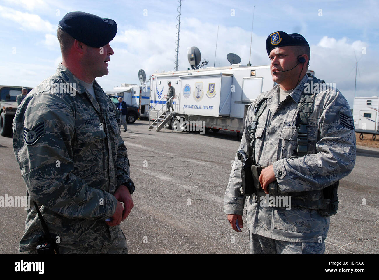 Staff Sgt. Chad Peebles (left) and Tech Sgt. Eric Peter (right), of the ...