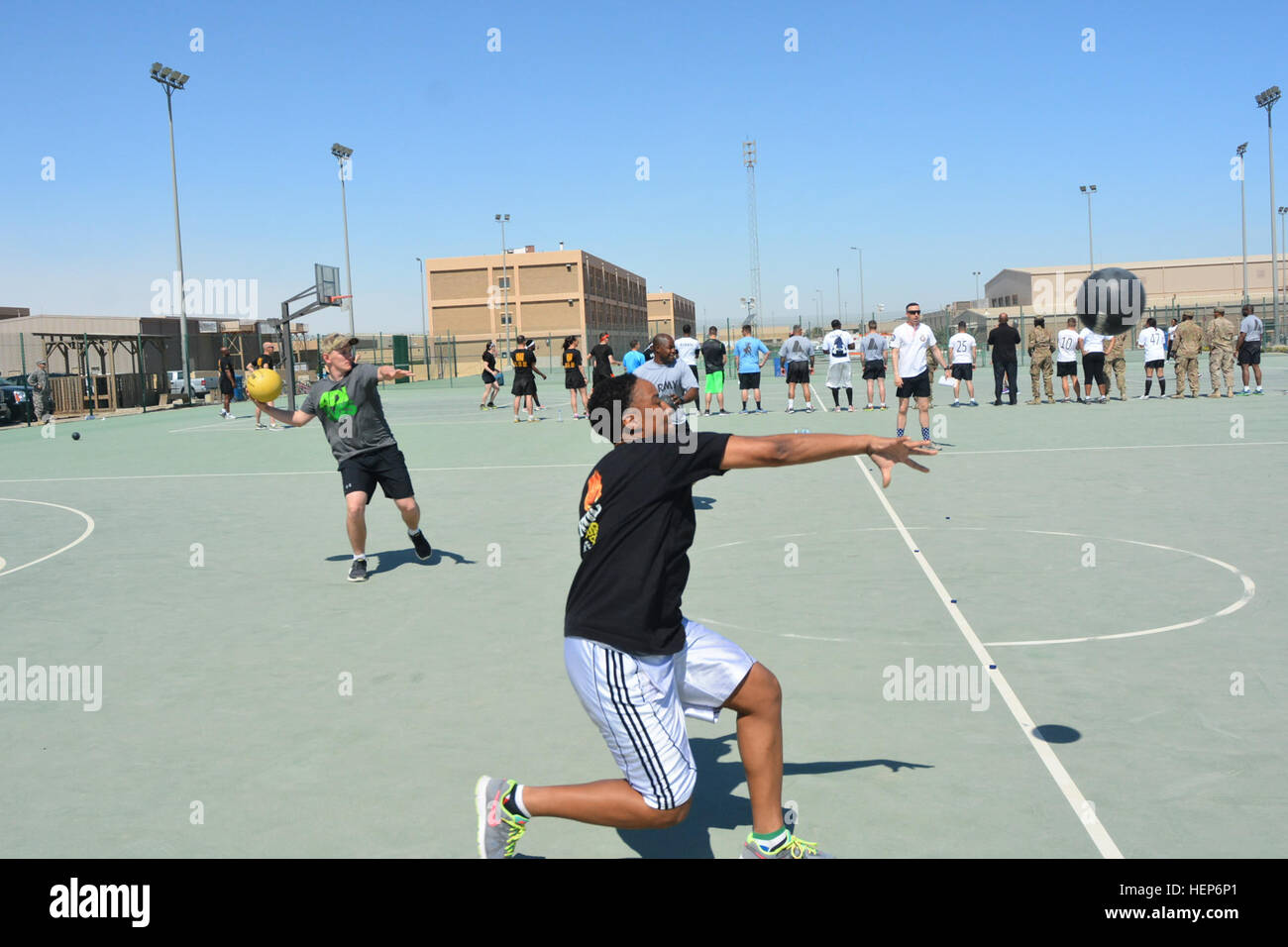 Left, Sgt. Matthew Treece and Staff Sgt. Nicole Johnson throw ...