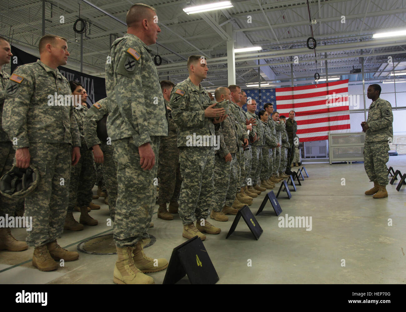 U.S. Army soldiers and partner nation paratroops are arranged in chalk ...