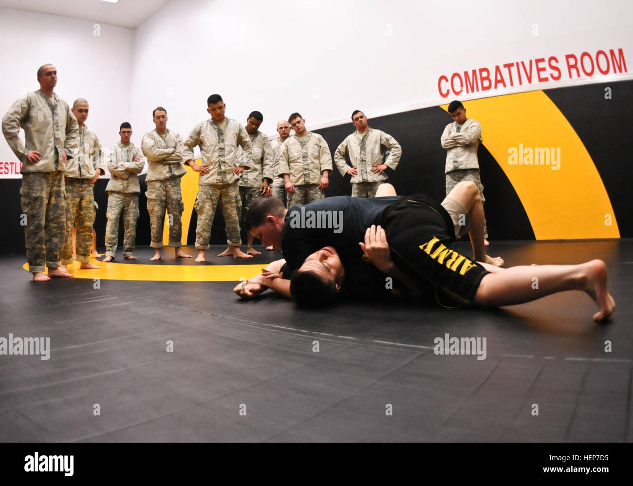 Sgt. Jesus Cisneros (bottom), a master combatives instructor and Staff ...